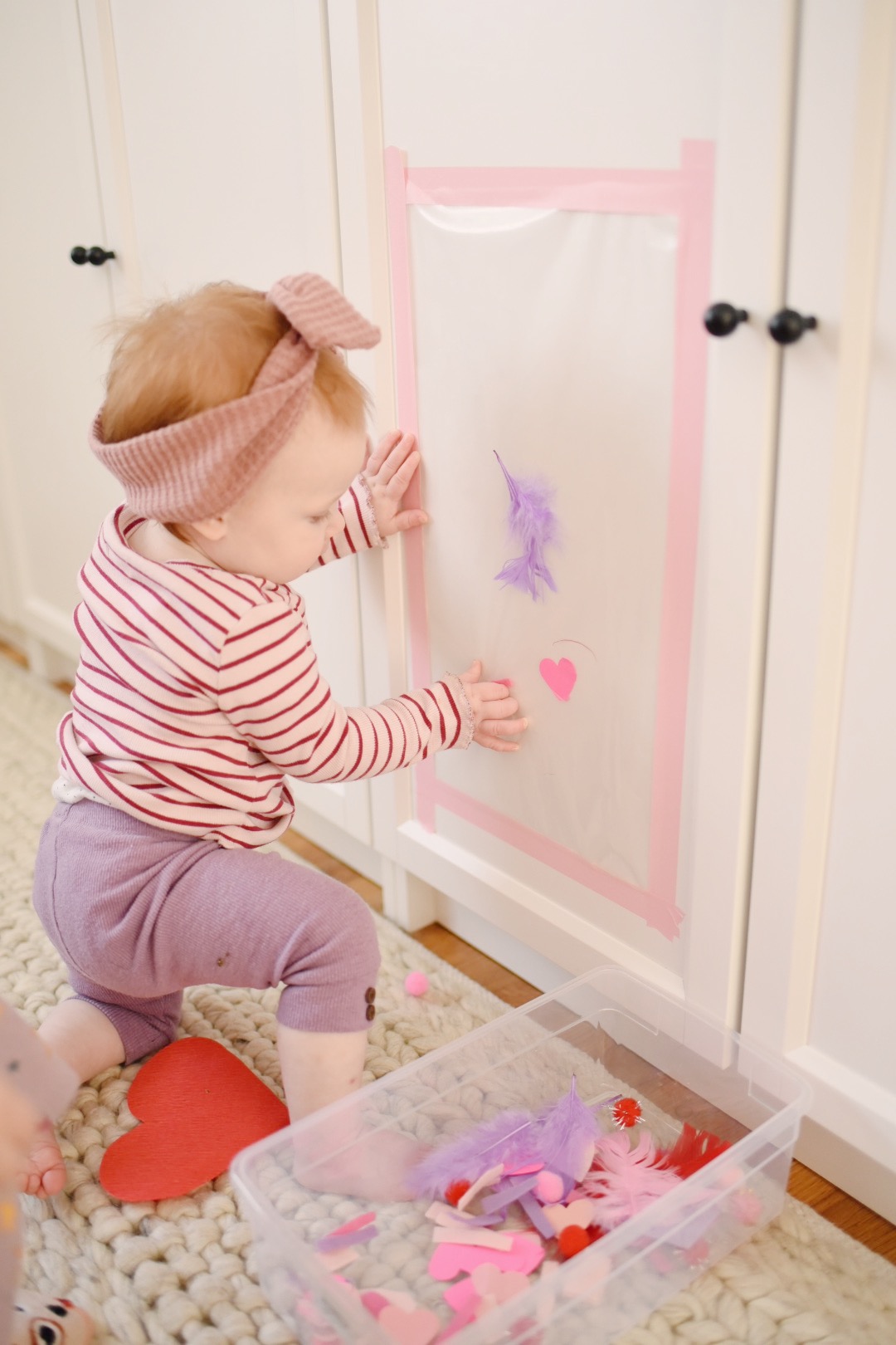 Valentine s Day Sensory Sticky Wall Activity For Babies The Mama Notes Valentine s Day Sensory Sticky Wall Activity For Babies The Mama Notes